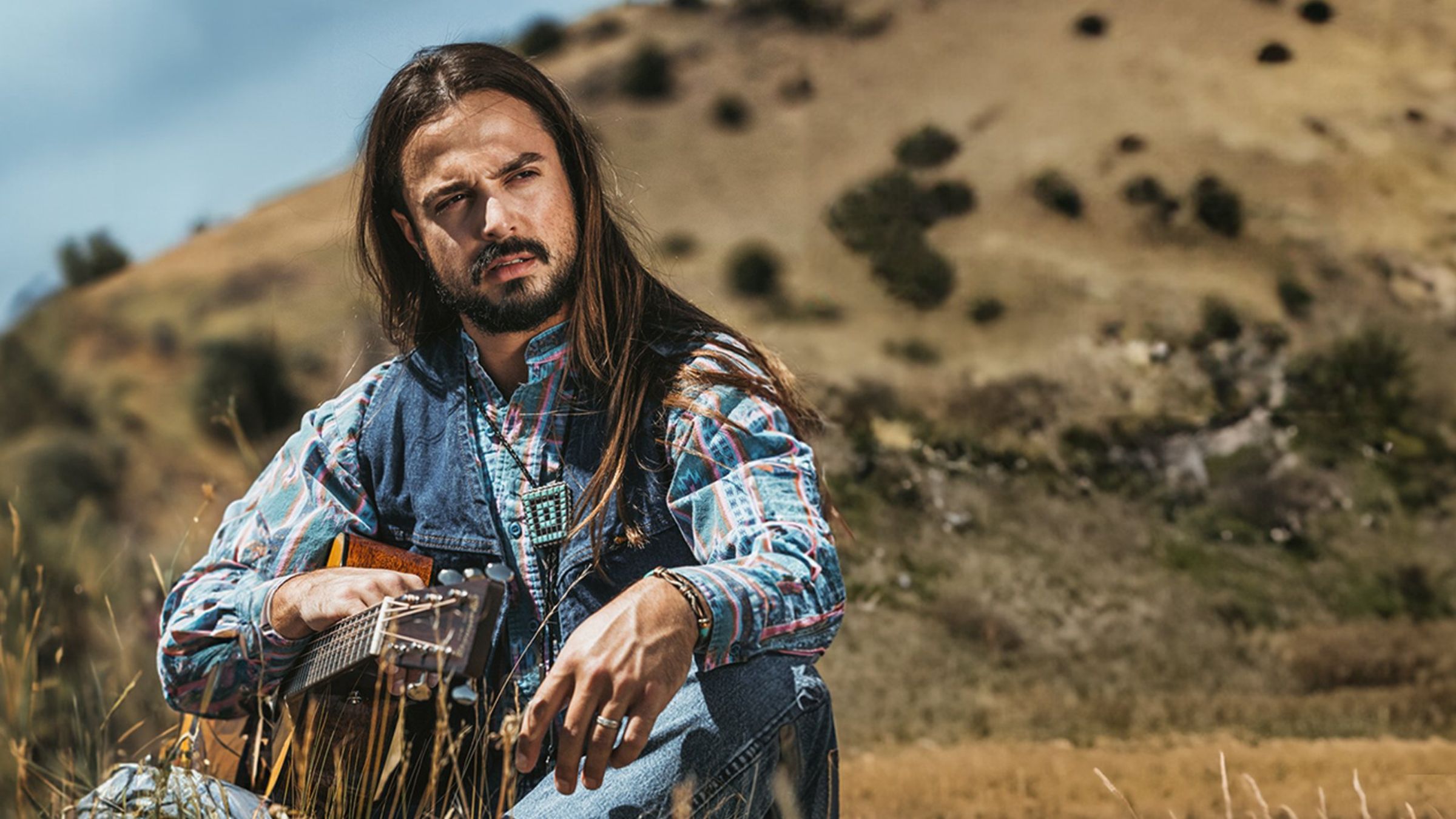 IAN MUNSICK RELEASES HEARTBREAKING COWBOY BALLAD: “YIPPIE-I-A”